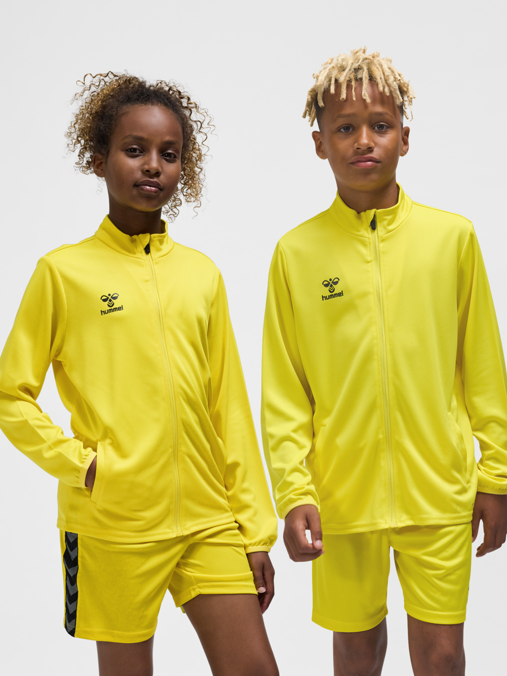 hummel ESSENTIAL TRACK JACKET KIDS - BLAZING YELLOW | hummel.dk